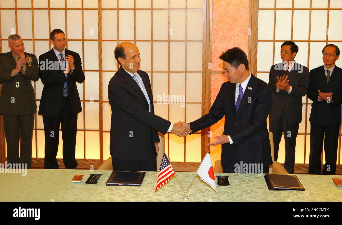 U.S. Ambassador to Japan John Roos, center left, and Japan's Foreign ...