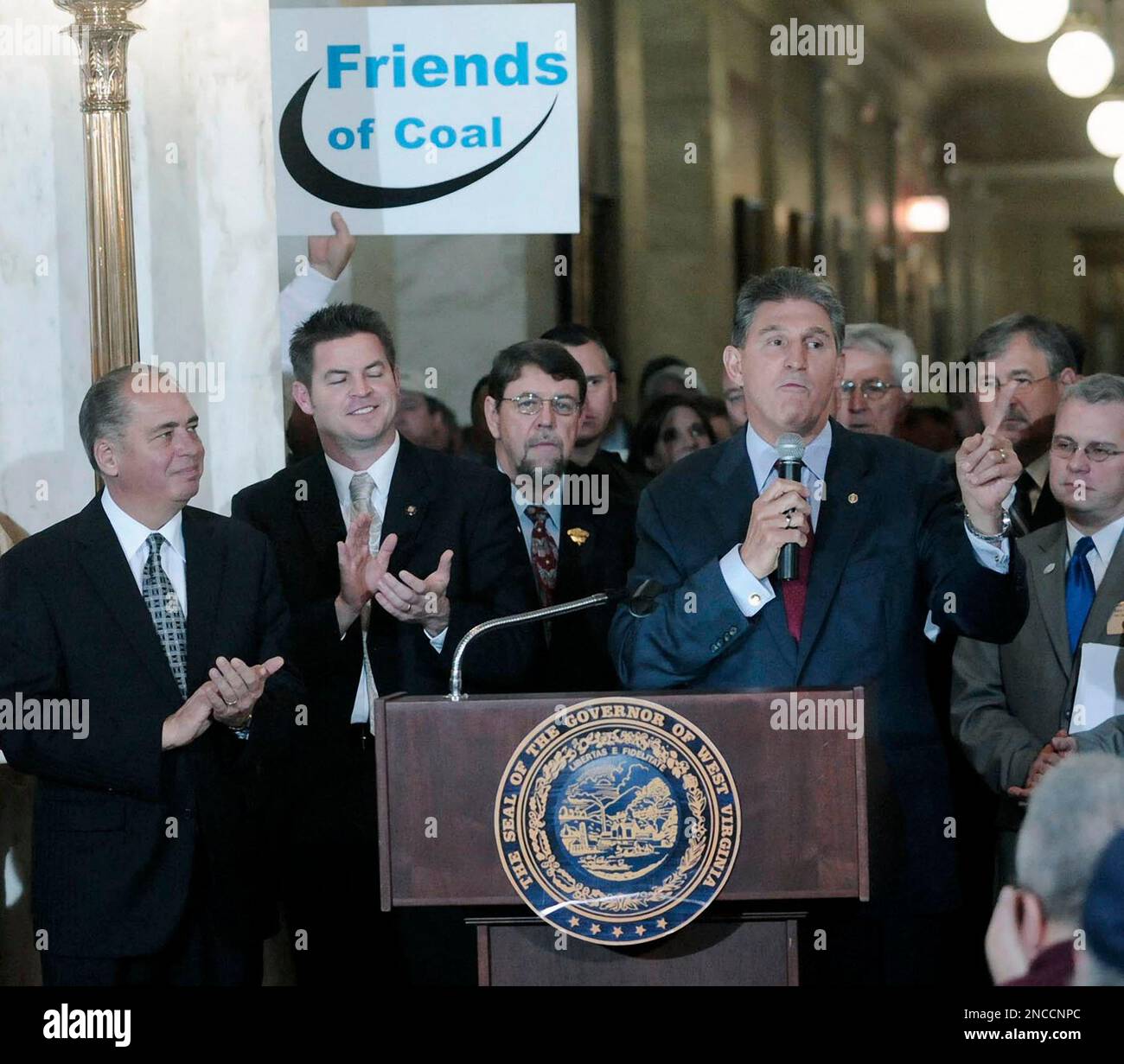 Sen. Joe Manchin, right at podium, and West Virginia Gov. Earl Ray ...