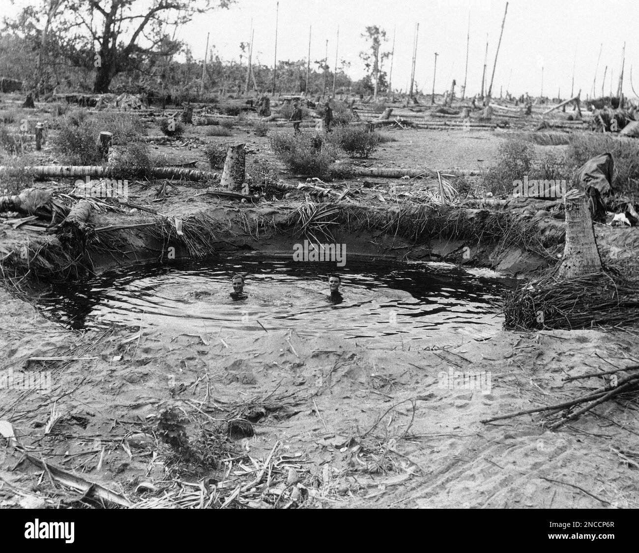 A bomb from a Flying Fortress scooped out a big crater in man attack on ...