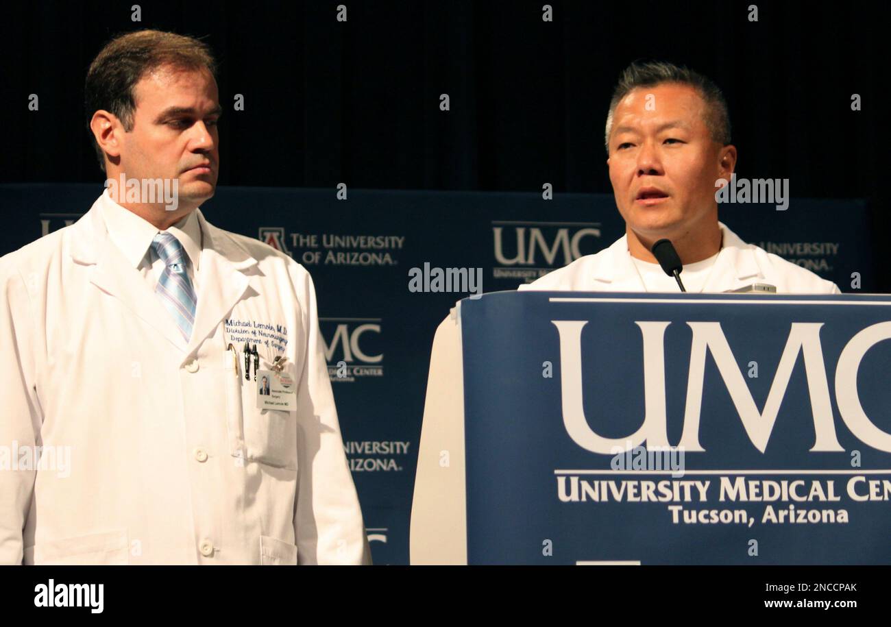 Drs. Michael Lemole, left, and Peter Rhee take questions about the ...