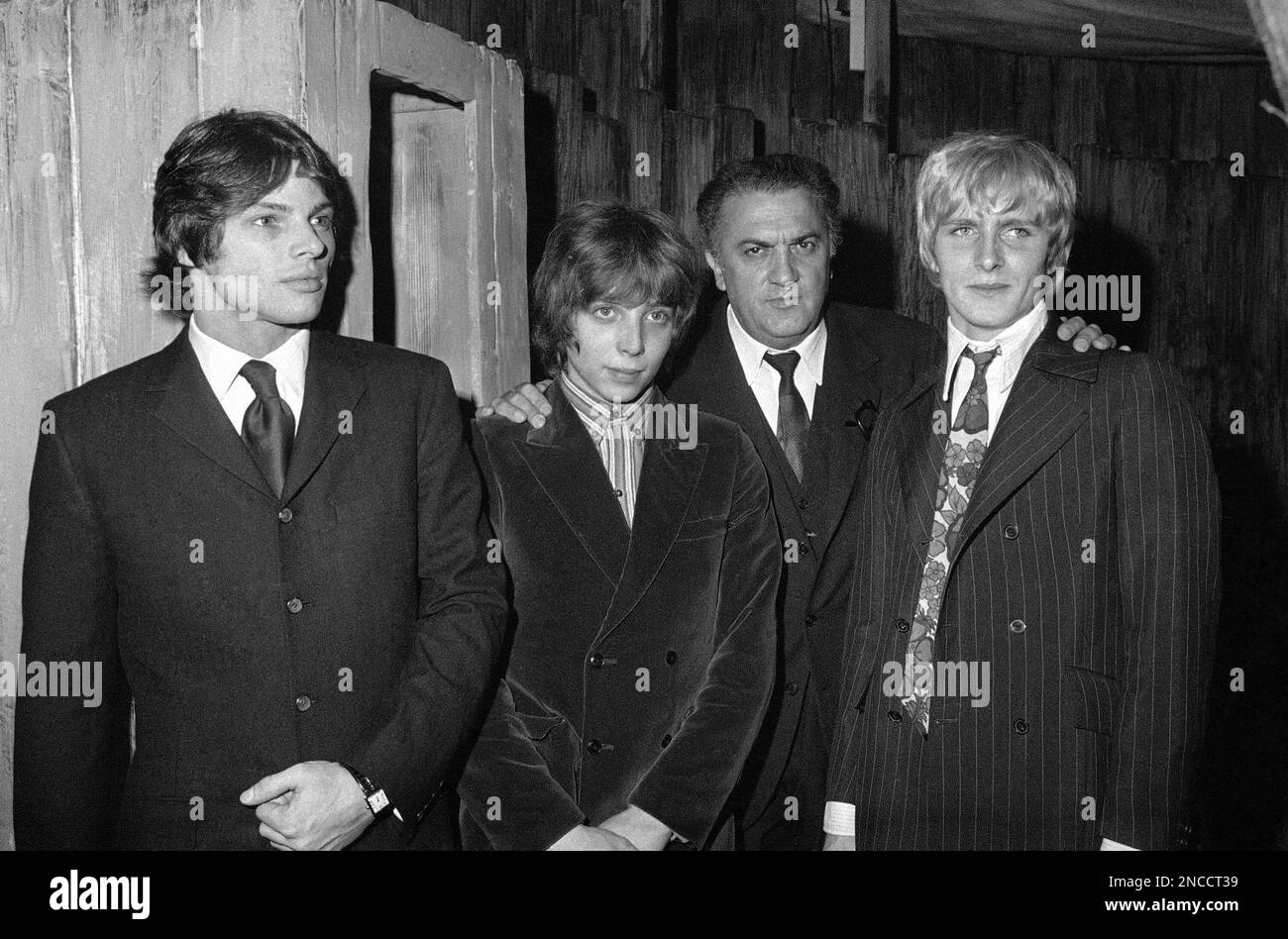 Italian movie director Federico Fellini (second from right) introduces ...