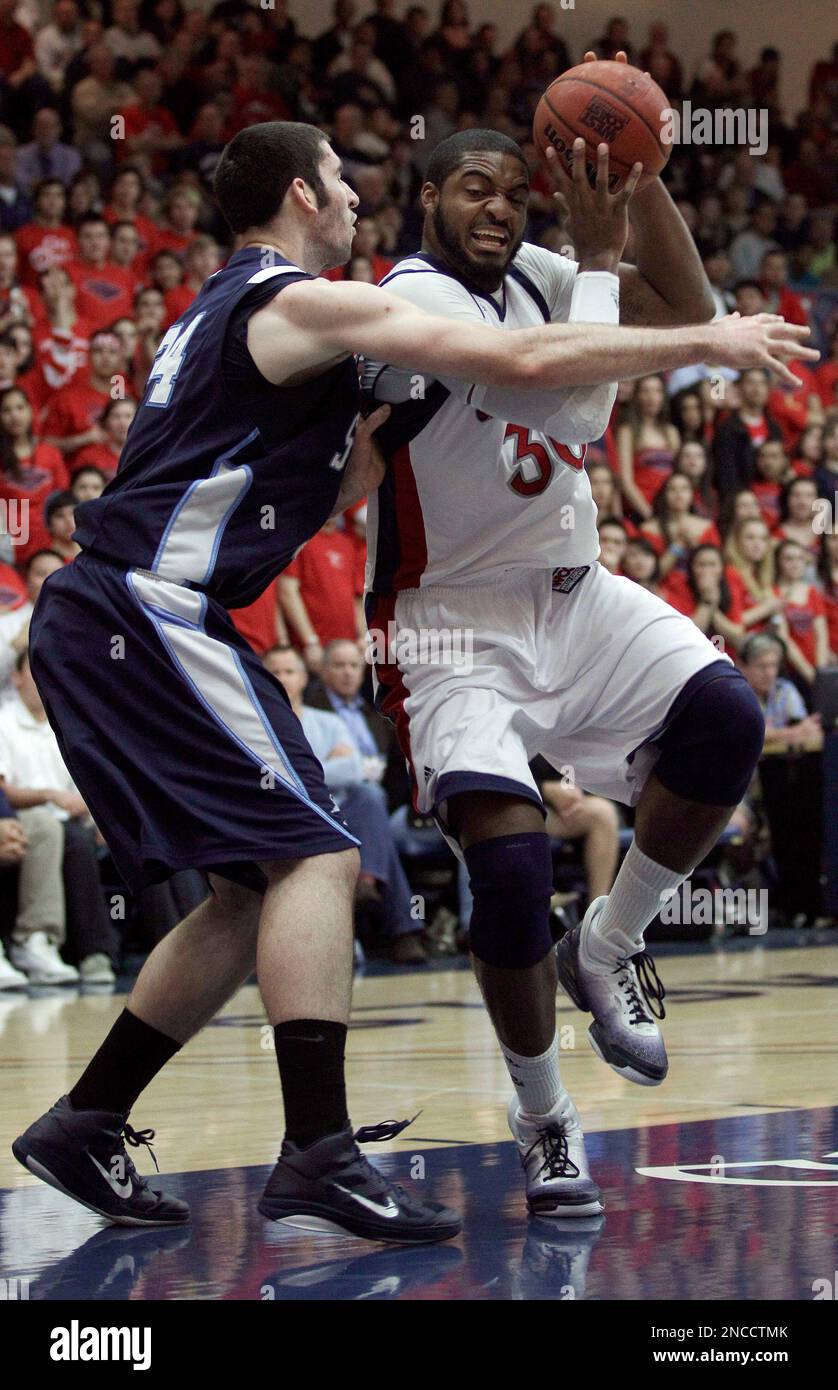 Saint Mary's forward Kenton Walker II (30) drives against San Diego ...
