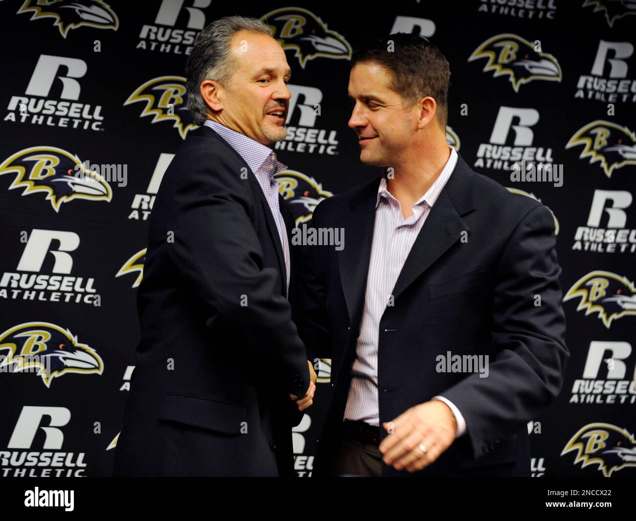 Baltimore Ravens head coach John Harbaugh, right, and new defensive ...