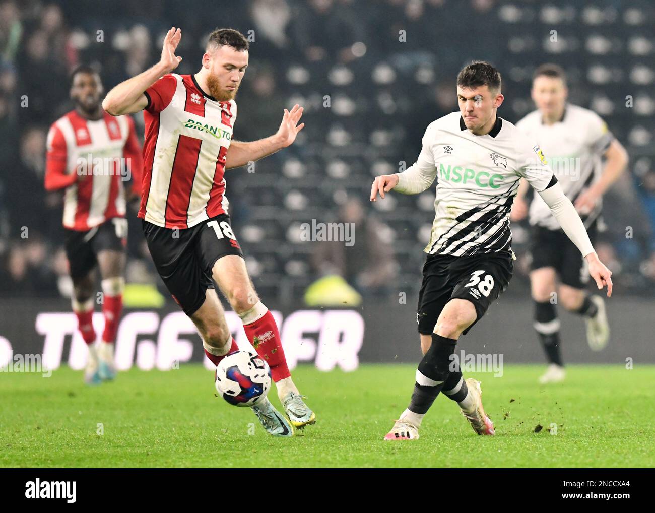 Derby, UK. 14th Feb, 2023. Jason Knight (Derby County) and Ben House ...