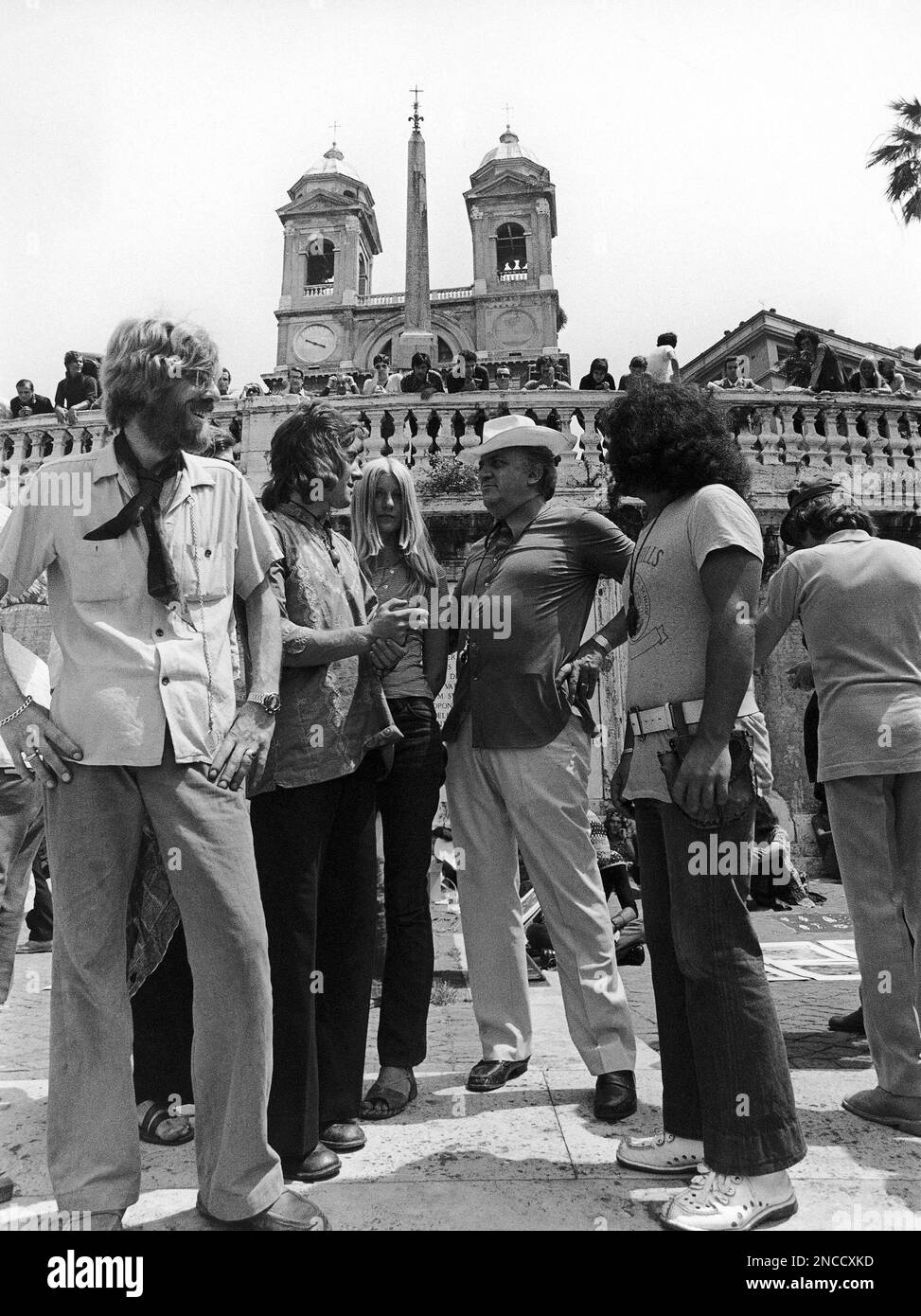 Italian director Federico Fellini is surrounded by actors portraying ...