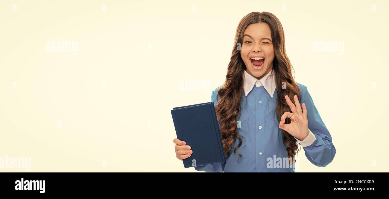 Its OK to be smart. Playful child show OK sign. Library book. School ...