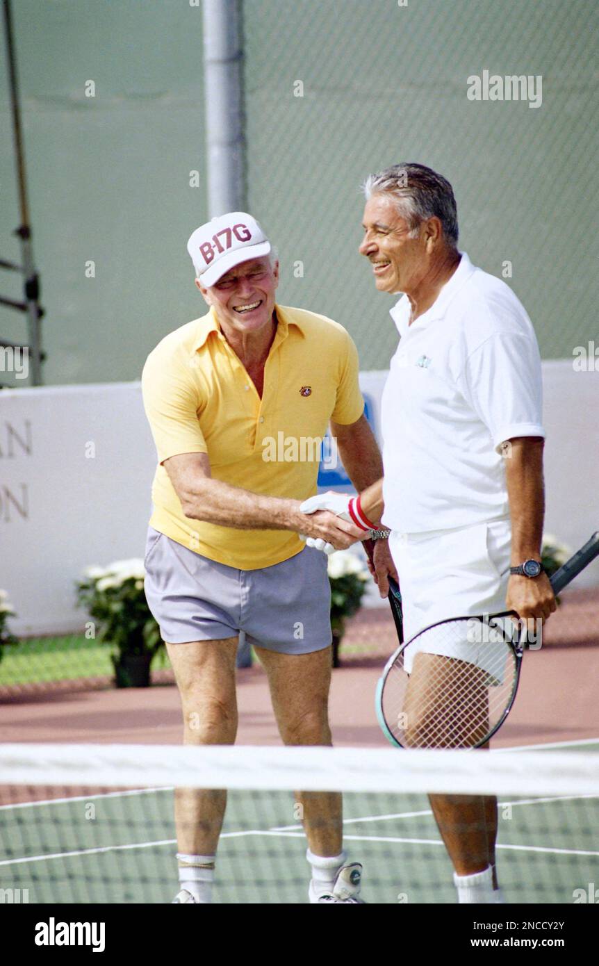 Actor Charlton Heston, left, and former tennis pro Pancho Gonzales ...
