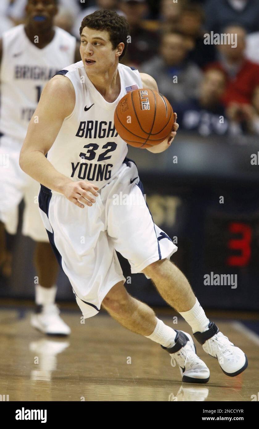 BYU's Jimmer Fredette looks to pass the ball during the first half ...