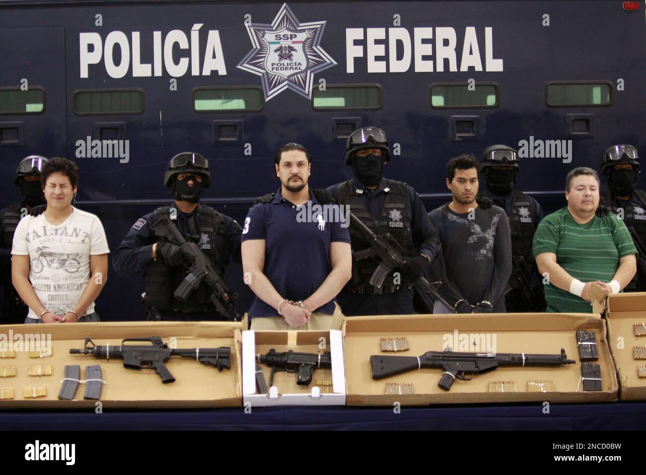 Jose Jorge Balderas Garza, aka "J.J.,", center left, is presented to ...