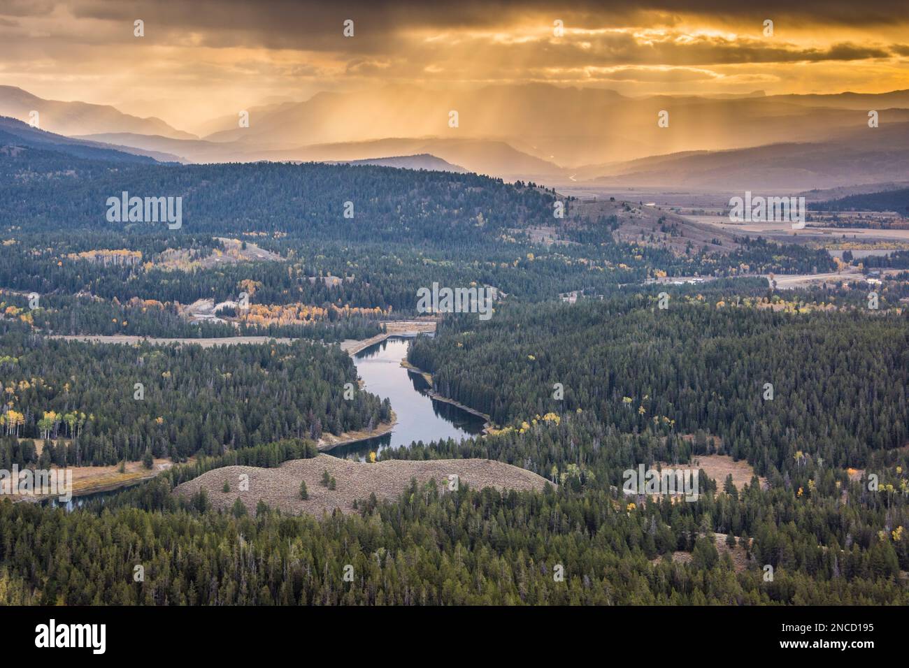 A storm breaks over the Buffalo Fork on the east side of Grand Teton ...