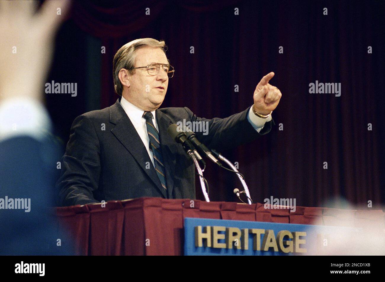 Rev. Jerry Falwell, chairman of the PTL ministry points to a reporter ...