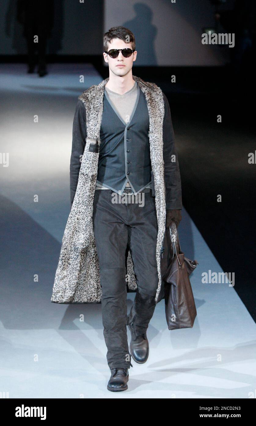 A model wears a creation from the Giorgio Armani men's Fall-Winter 2011 ...