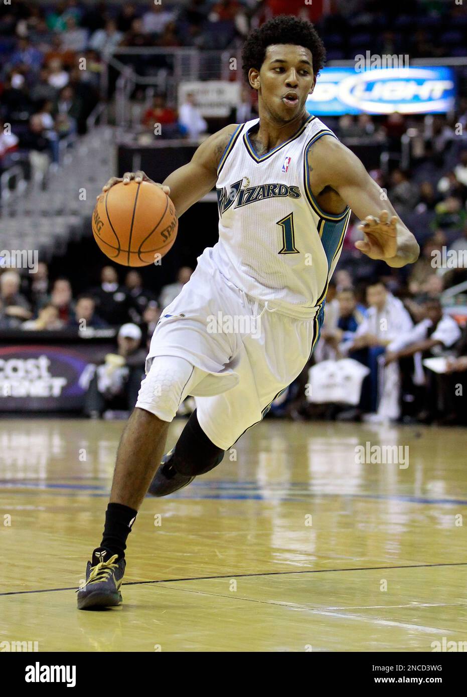 Washington Wizards guard Nick Young drives downcourt in the first half ...