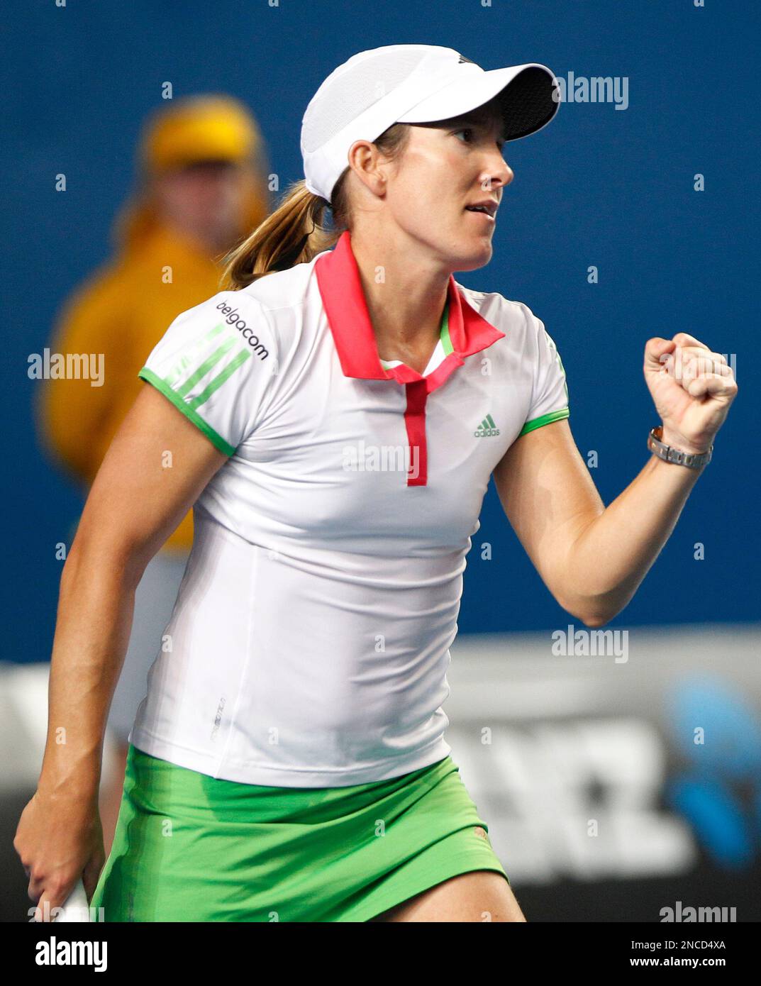Belgium's Justine Henin celebrates her win over India's Sania Mirza ...