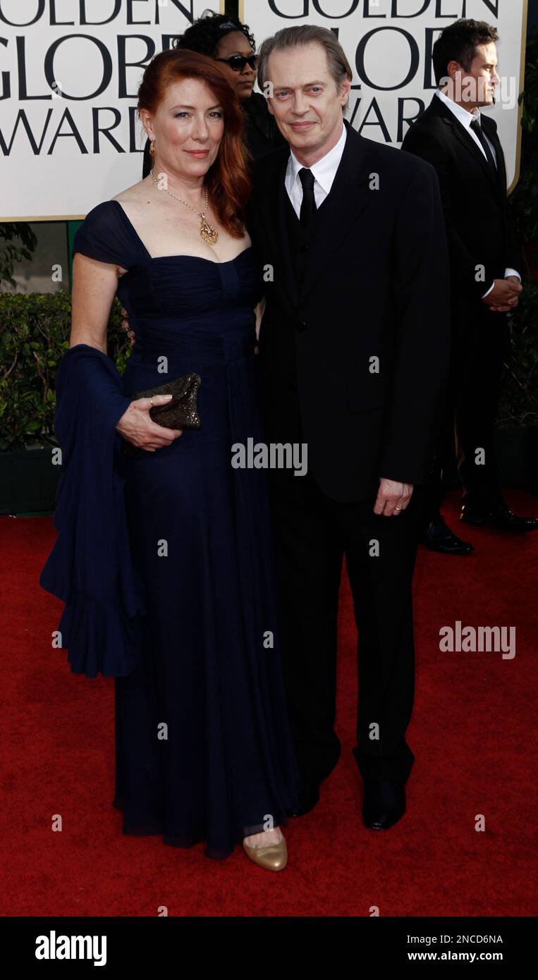 Steve Buscemi and his wife Jo Andres arrive for the Golden Globe Awards ...