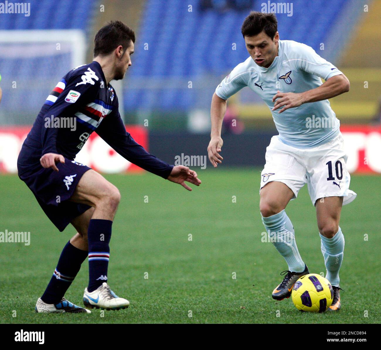 Lazio forward Mauro Zarate, of Argentina, right, is challenged by Sampdoria midfielder Daniele ...
