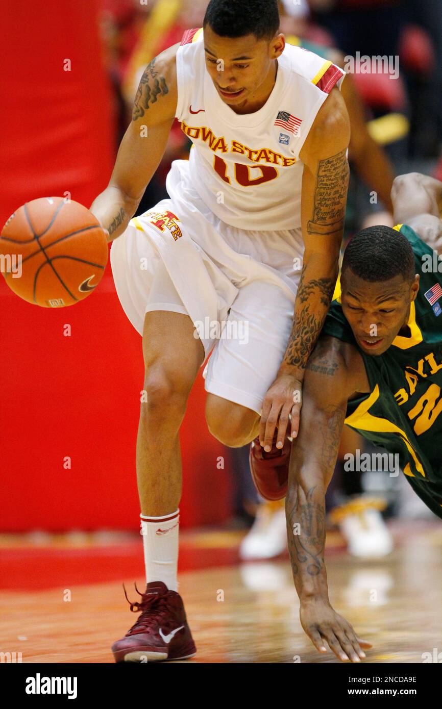 Iowa State guard Diante Garrett, left, steals the ball from Baylor ...