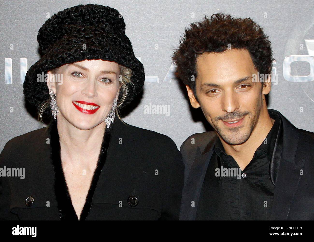 U.S. actress Sharon Stone, left, and French actor Tomer Sisley arrive ...