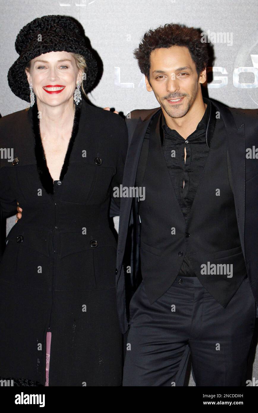 U.S. actress Sharon Stone and French actor Tomer Sisley arrive for the ...