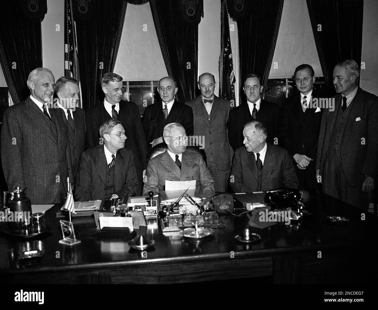 President Harry Truman congratulates 10 key scientists for their work ...