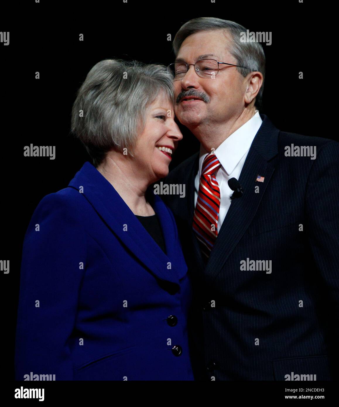Iowa Gov. Terry Branstad gets a hug from his wife Chris after taking ...