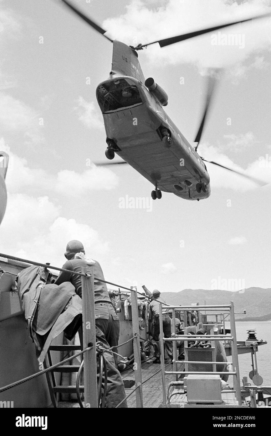 A helicopter capable of carrying 65 soldiers warms its engines on the ...