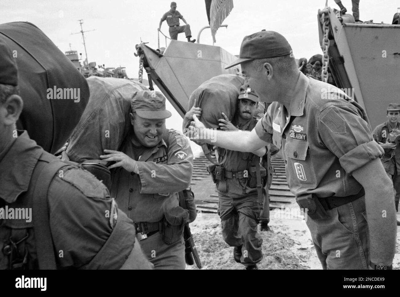 A pat on the back is given to a soldier of the U.S. Army First Infantry ...