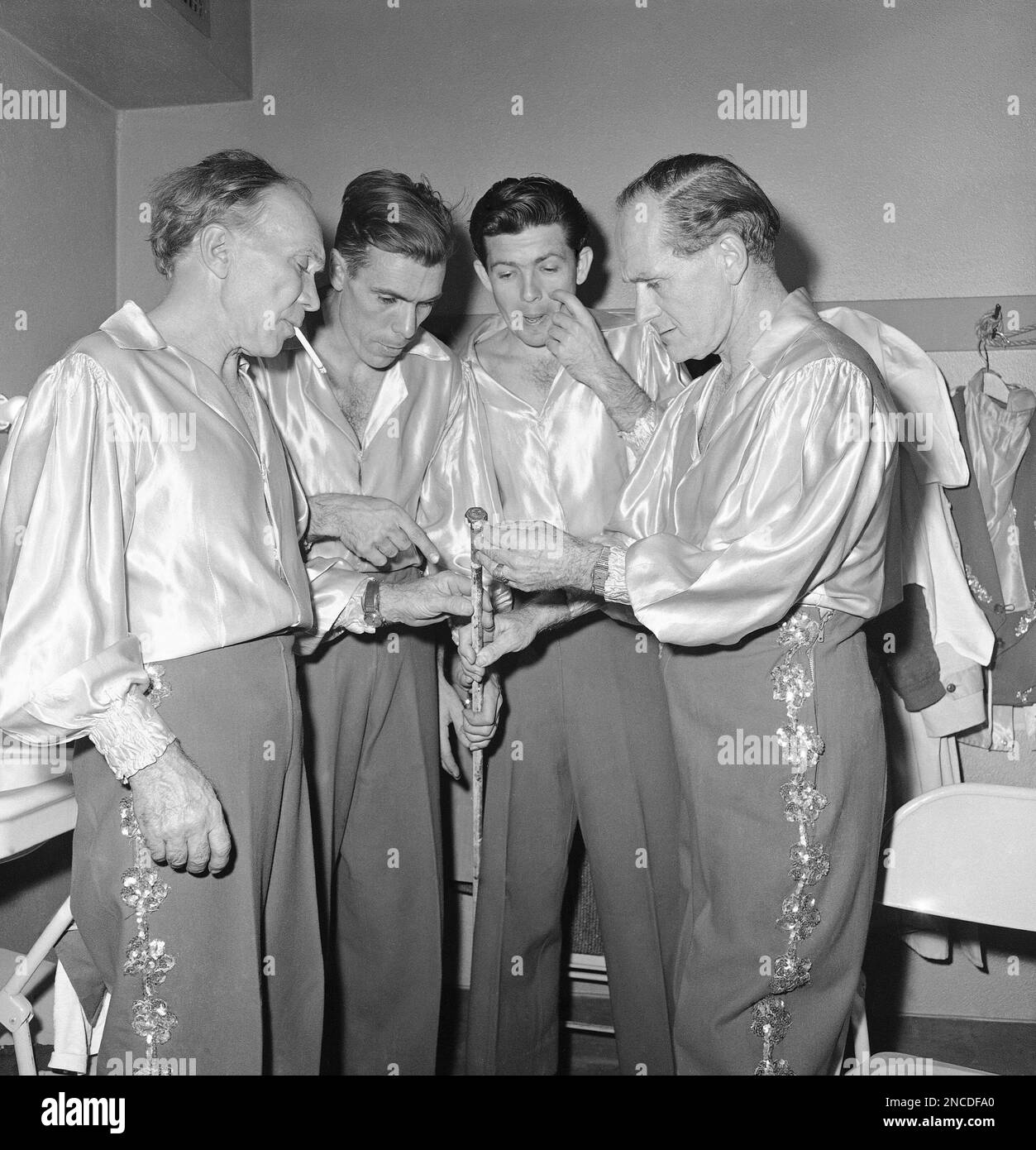 The Wallenda troupe in Minneapolis on March 1, 1962. Looking at a pipe ...