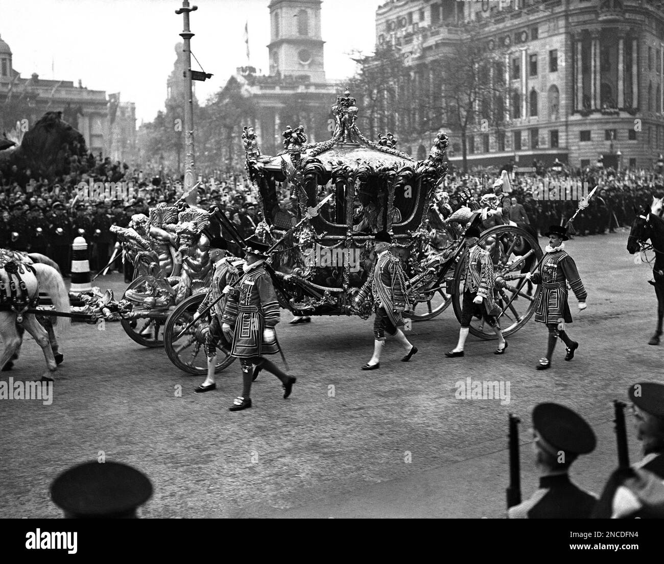 Britain's King George VI and Queen Elizabeth, wearing their crowns, in ...