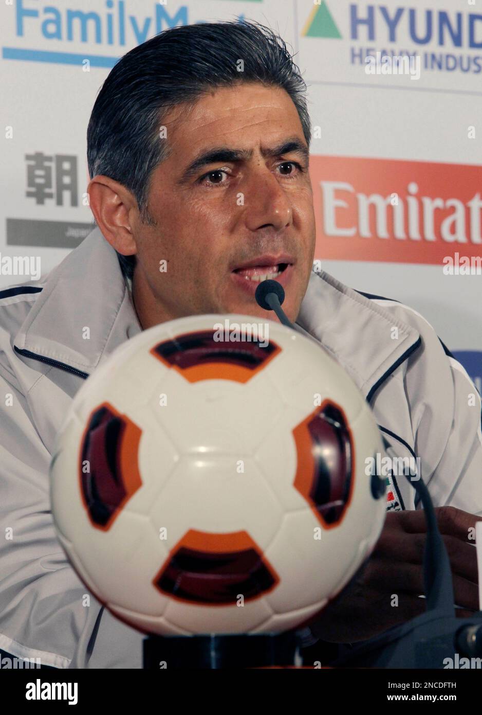Iran's national team coach Afshin Ghotbi, speaks during a press ...