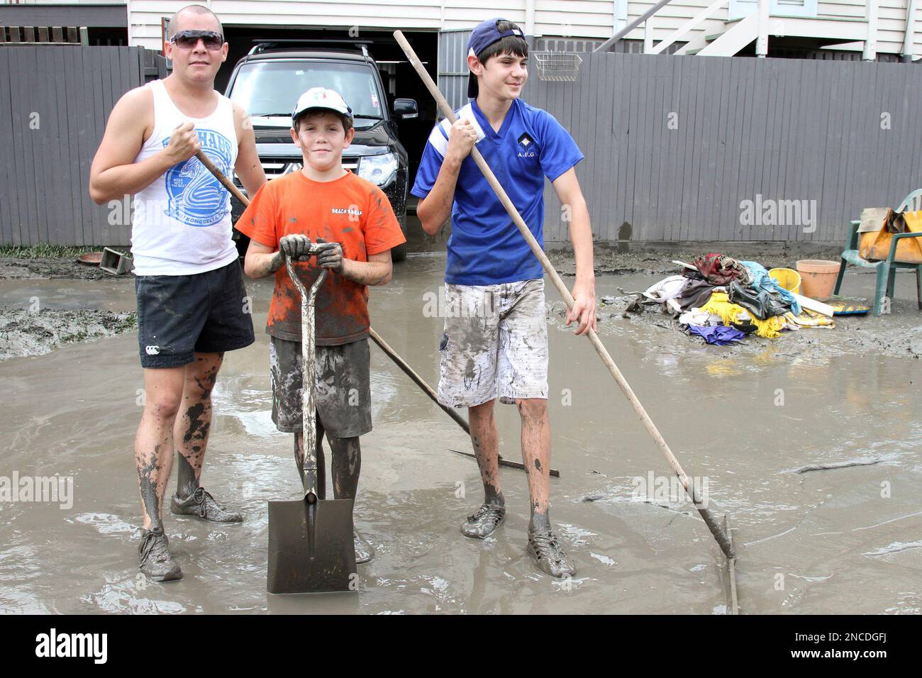 New Farm residents Simon Stapleton, left, and brothers Benjamin, center ...
