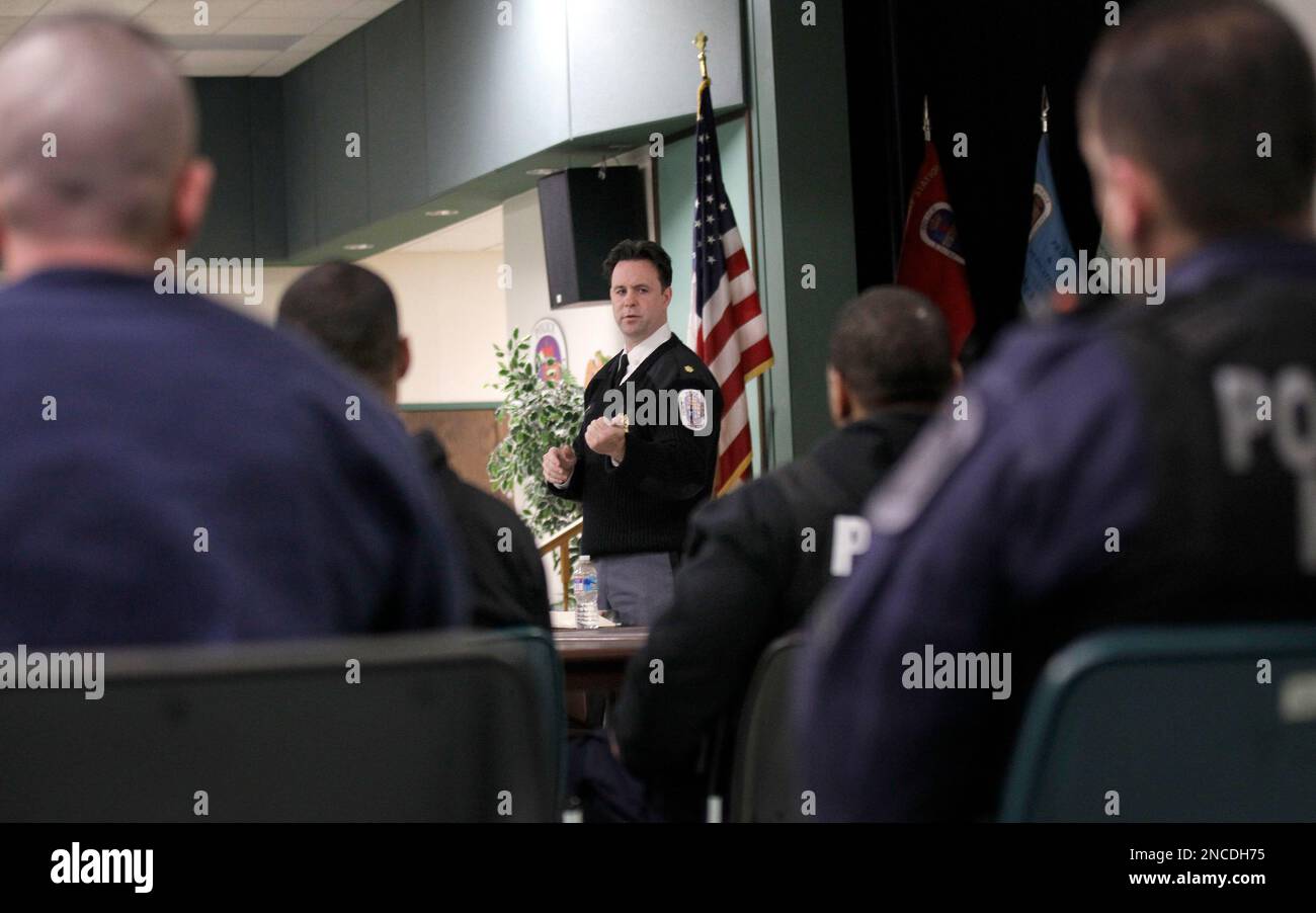 Major Joseph McCann, Commander Special Enforcement Unit, center, during ...