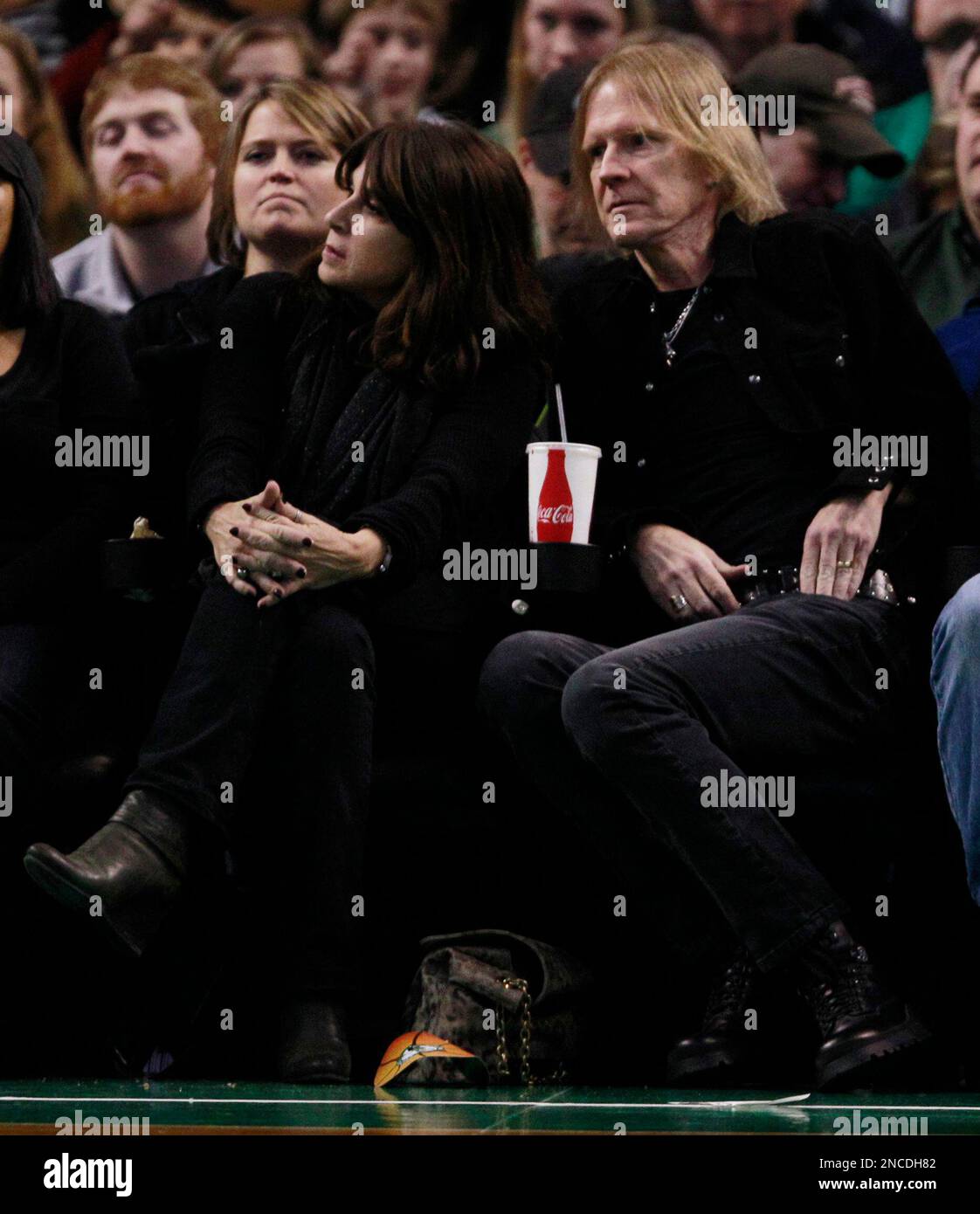 Aerosmith bass guitarist Tom Hamilton, right, and his wife Terry watch ...