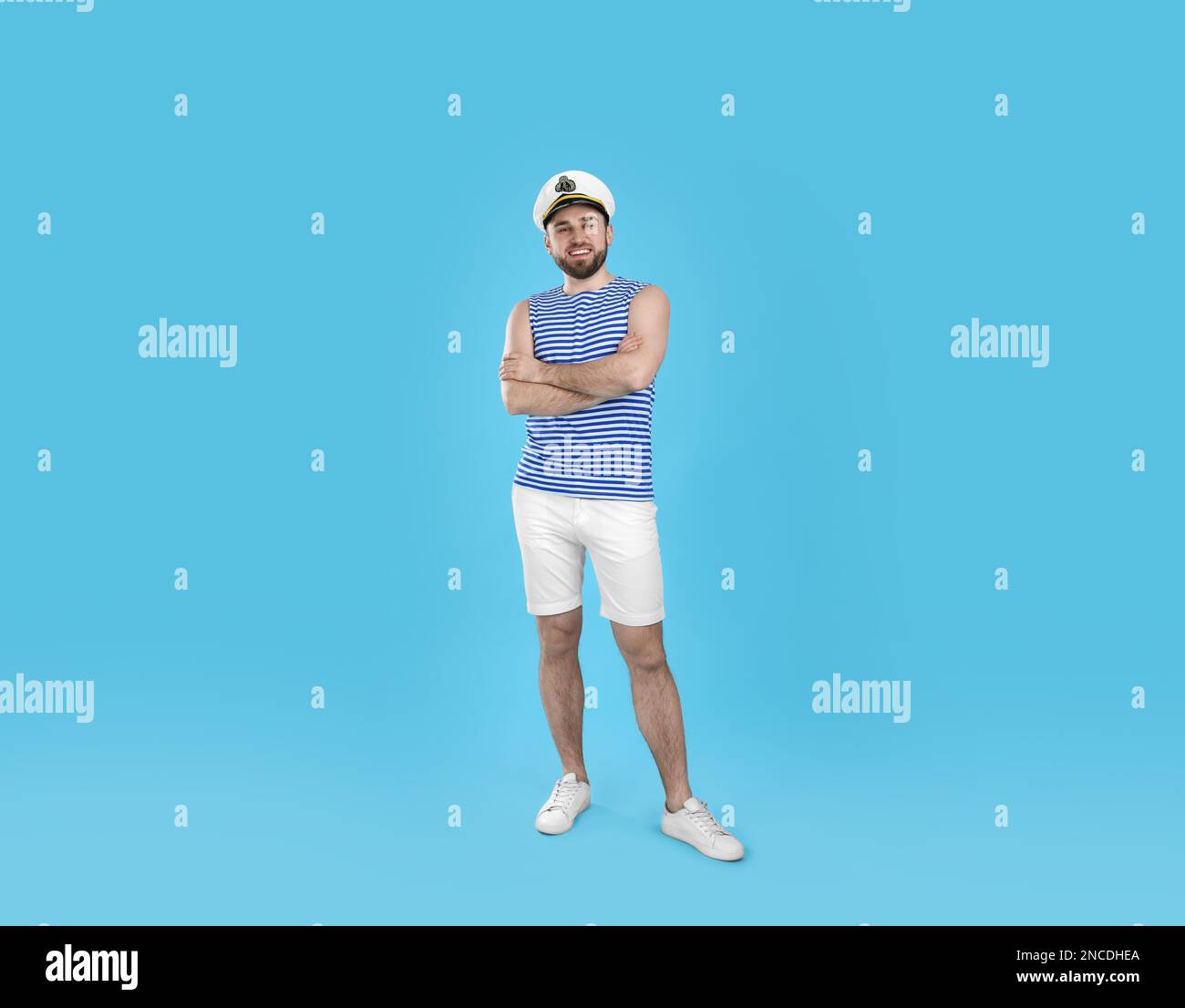 Full length portrait of sailor on light blue background Stock Photo - Alamy