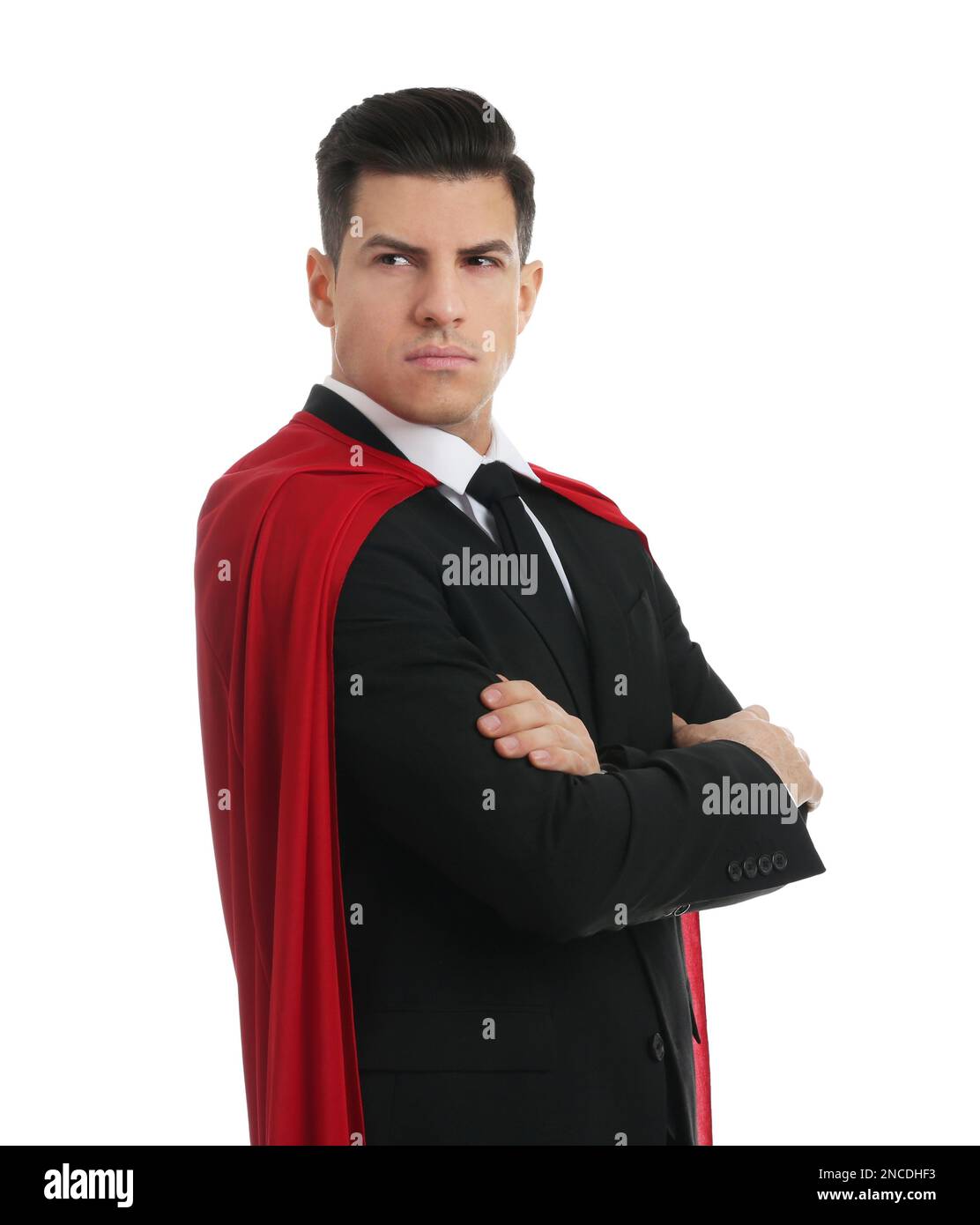 Man wearing superhero cape on white background Stock Photo - Alamy