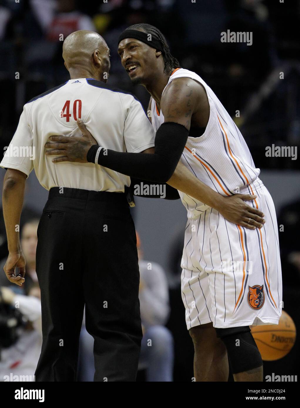 Charlotte Bobcats' Gerald Wallace, right, argues a call with referee ...