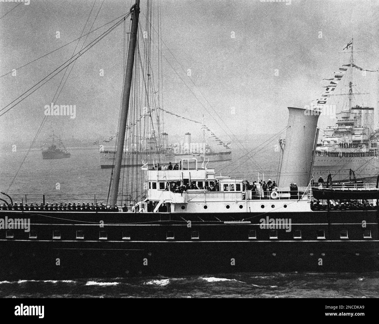 The royal yacht “Victoria and Albert” passing the cruiser “London” , in background, on May 20 ...