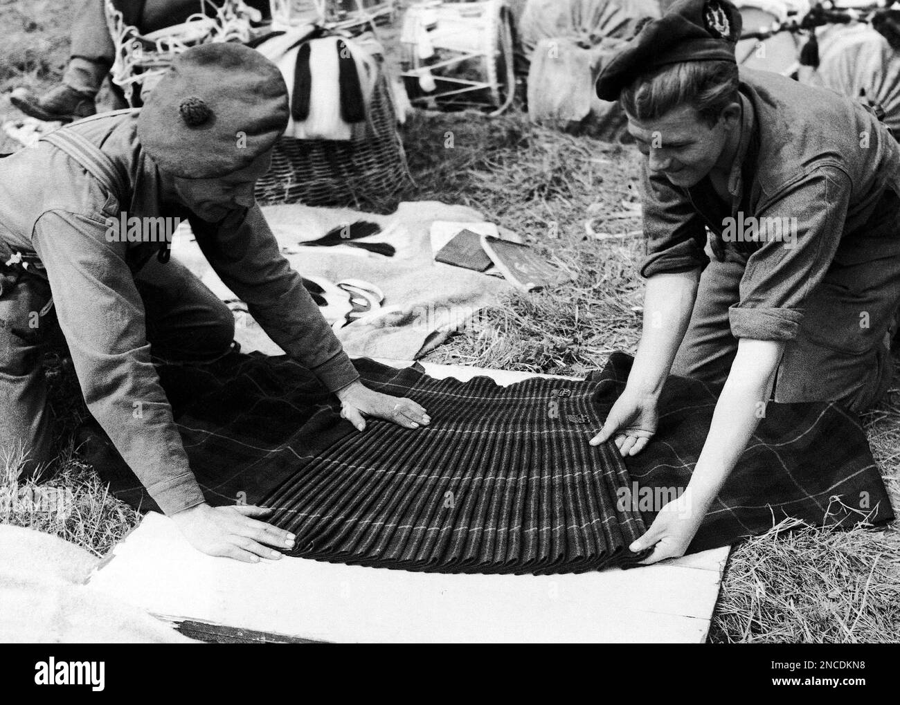 The heavy rains have taken the creases out of the kilts and Piper Milne ...