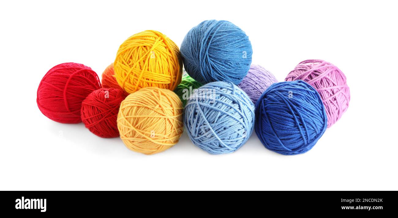 Soft colorful woolen yarns on white background Stock Photo - Alamy