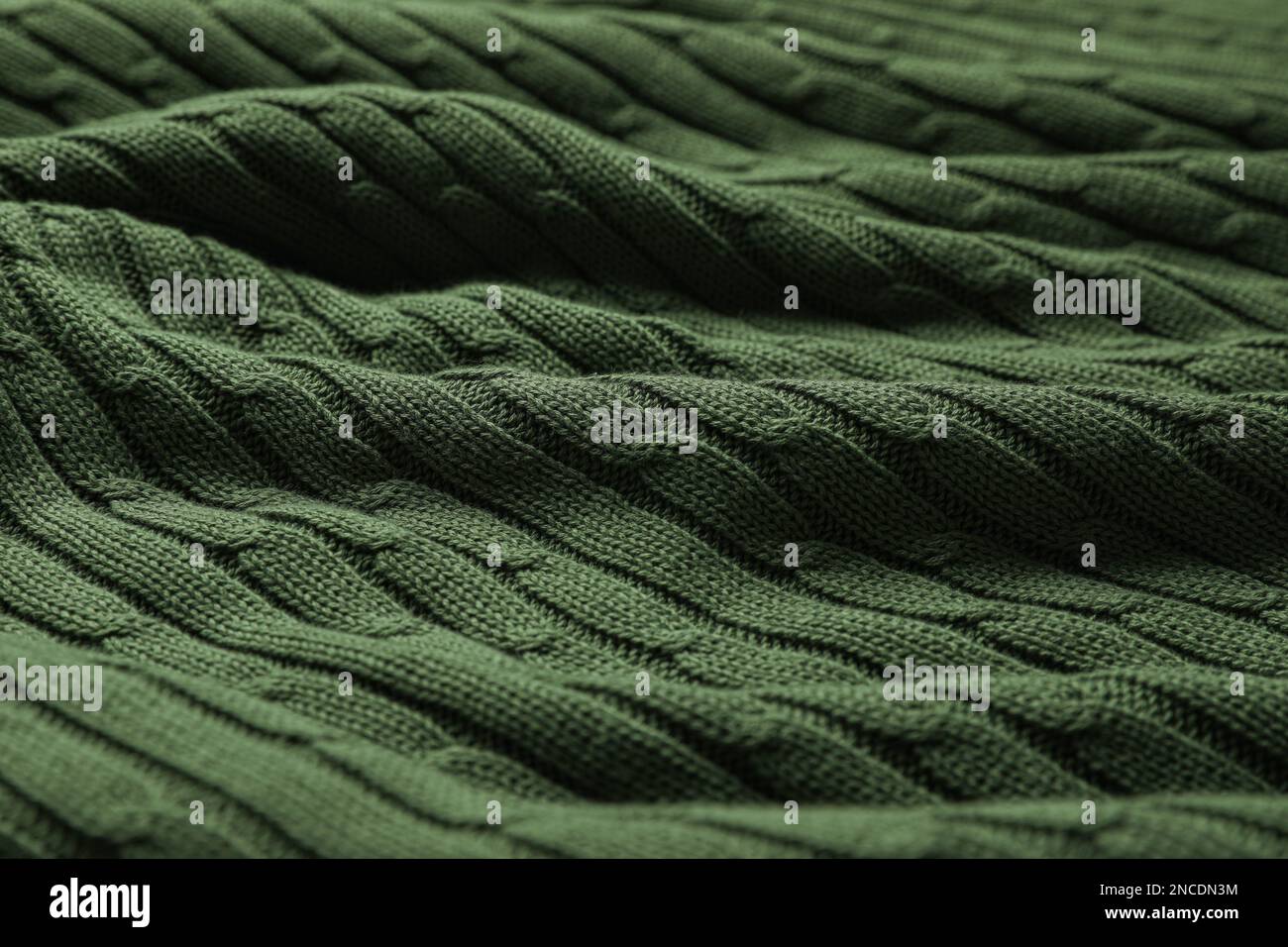 Dark green knitted wool texture as background, closeup Stock Photo - Alamy