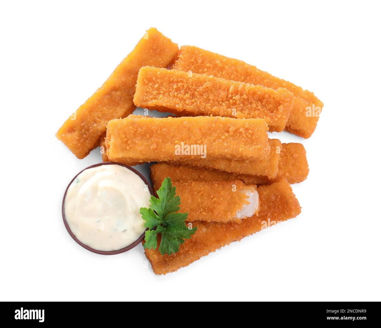 Fresh breaded fish fingers with parsley and sauce on white background ...