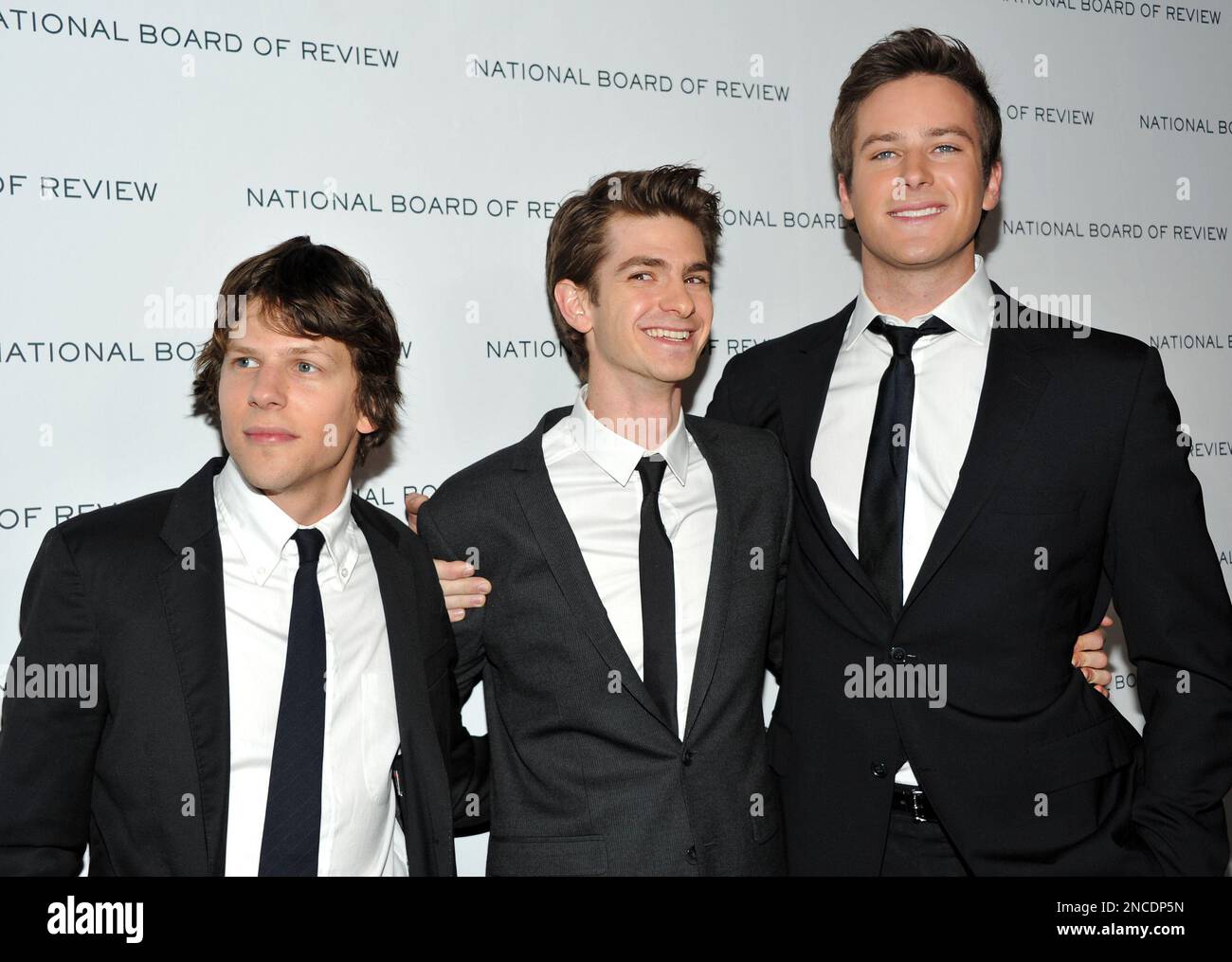 Best Actor winner Jesse Eisenberg, left, actor Andrew Garfield and ...