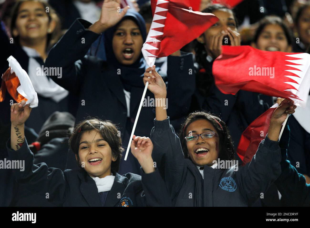 Qatari soccer fans cheer for their team before their AFC Asian Cup ...