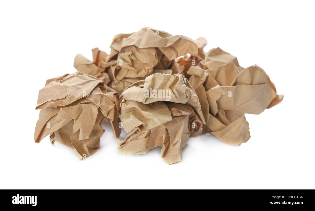 Crumpled sheets of kraft paper on white background Stock Photo - Alamy