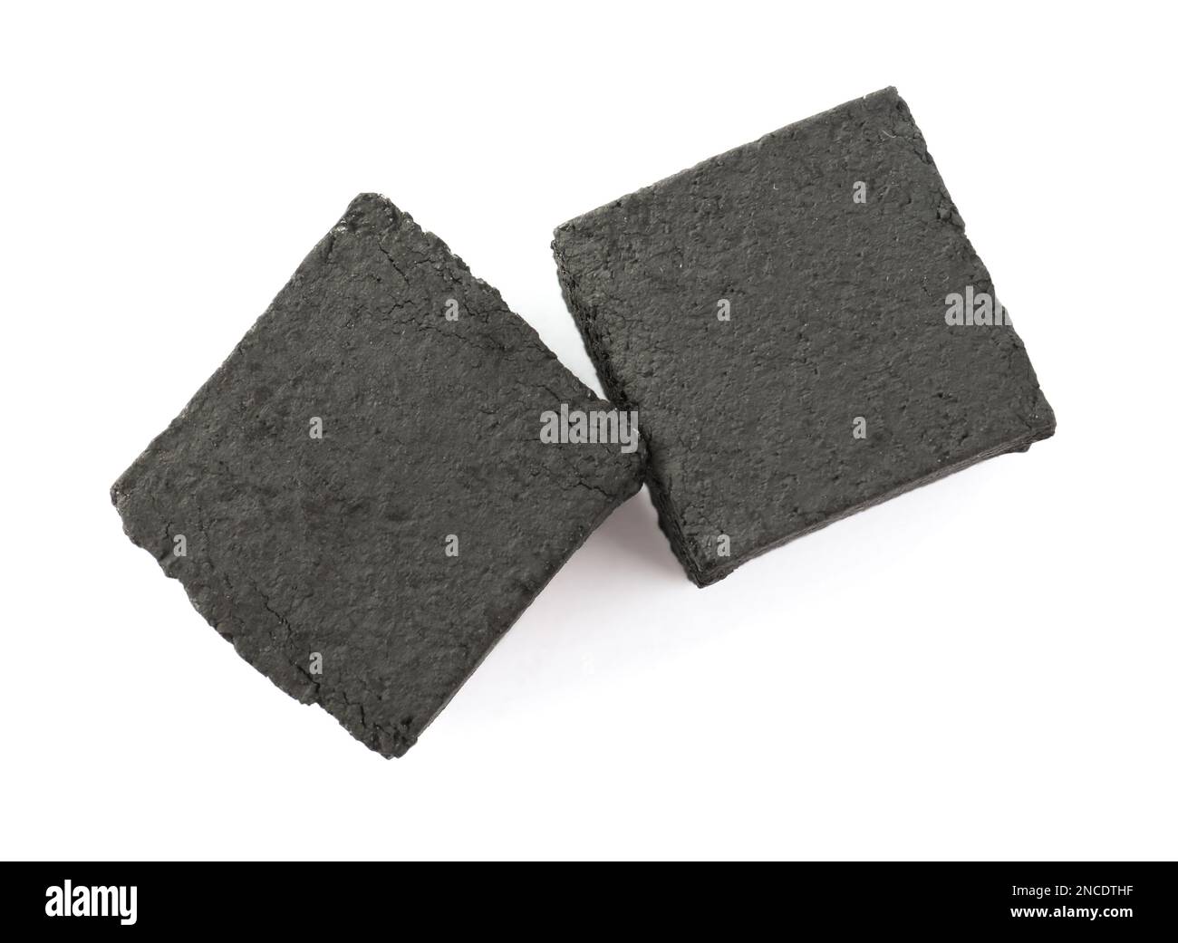 Charcoal cubes for hookah on white background, top view Stock Photo - Alamy