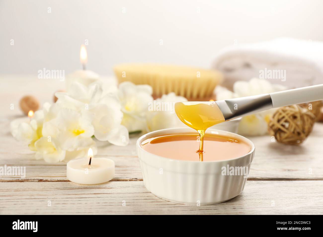 Cosmetic product for spa body wraps on white wooden background Stock ...