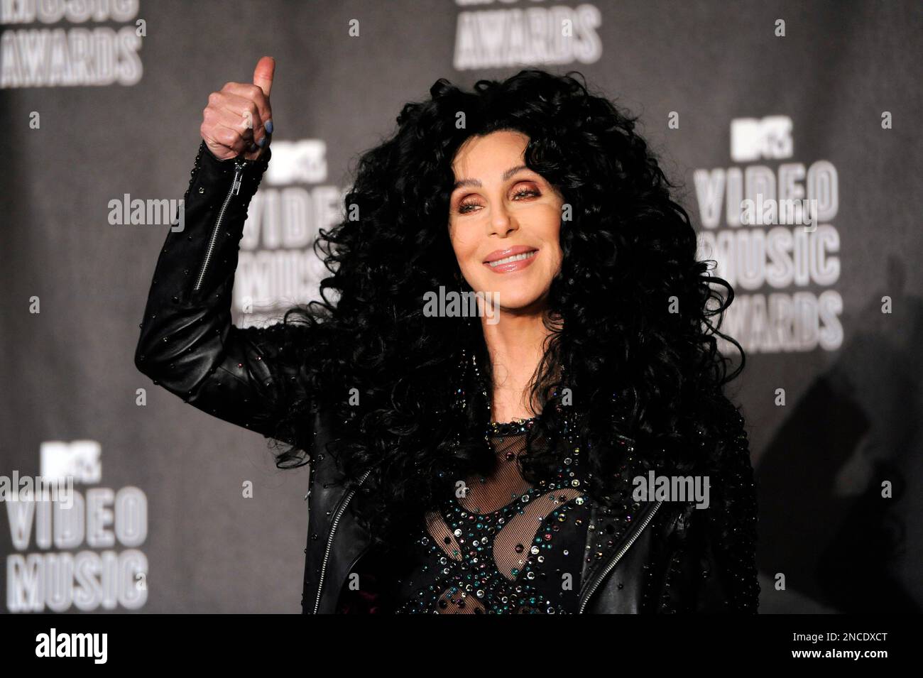 Cher poses in the press room at the MTV Video Music Awards on Sunday ...