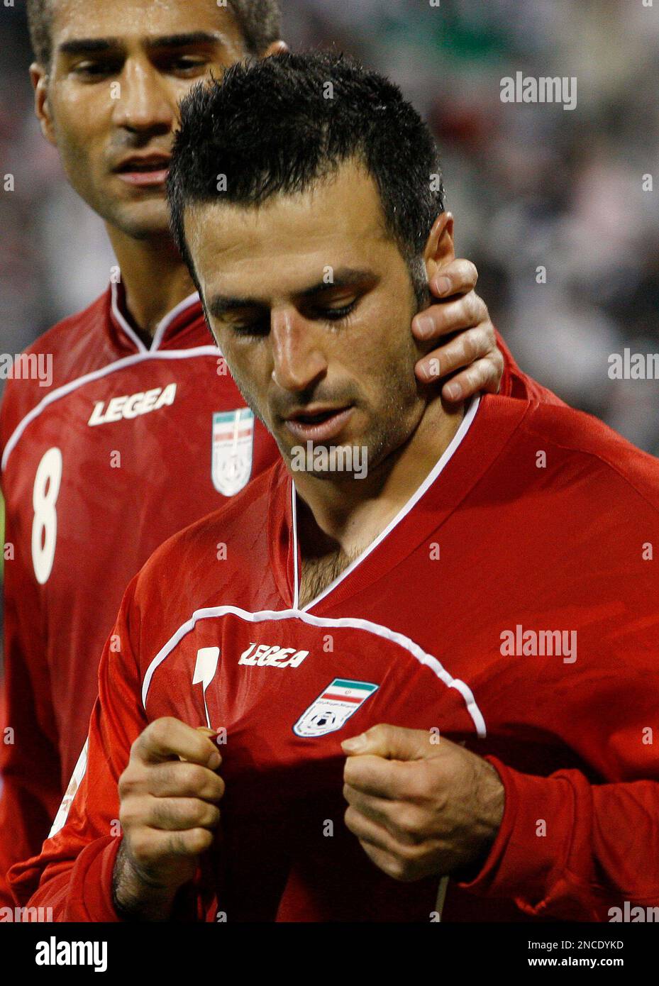 Iran's Gholam Reza Rezaei, right, reacts after scoring goal during ...