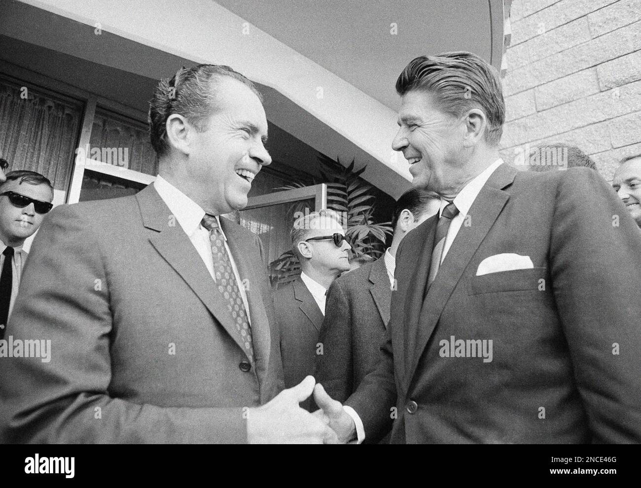 Richard Nixon greets Gov. Ronald Reagan, right, as the California chief ...
