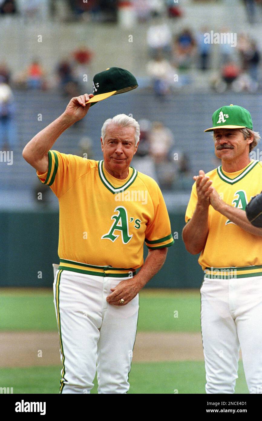 Former Oakland A’s manager and Hall of Famer, Joe DiMaggio tips his hat ...